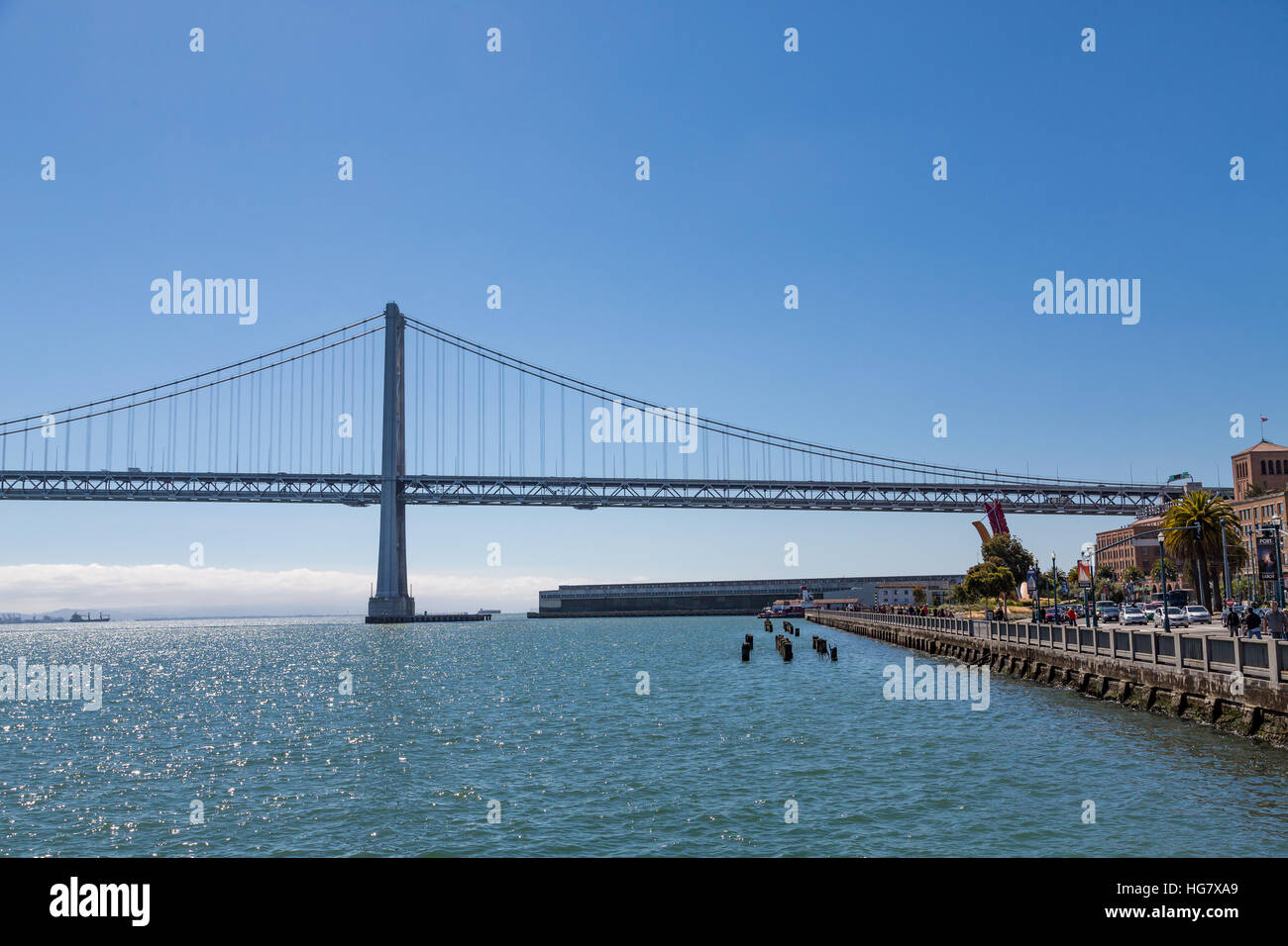 San Francisco Waterfront and Bay Bridge Under Blue Sky Stock Photo - Alamy