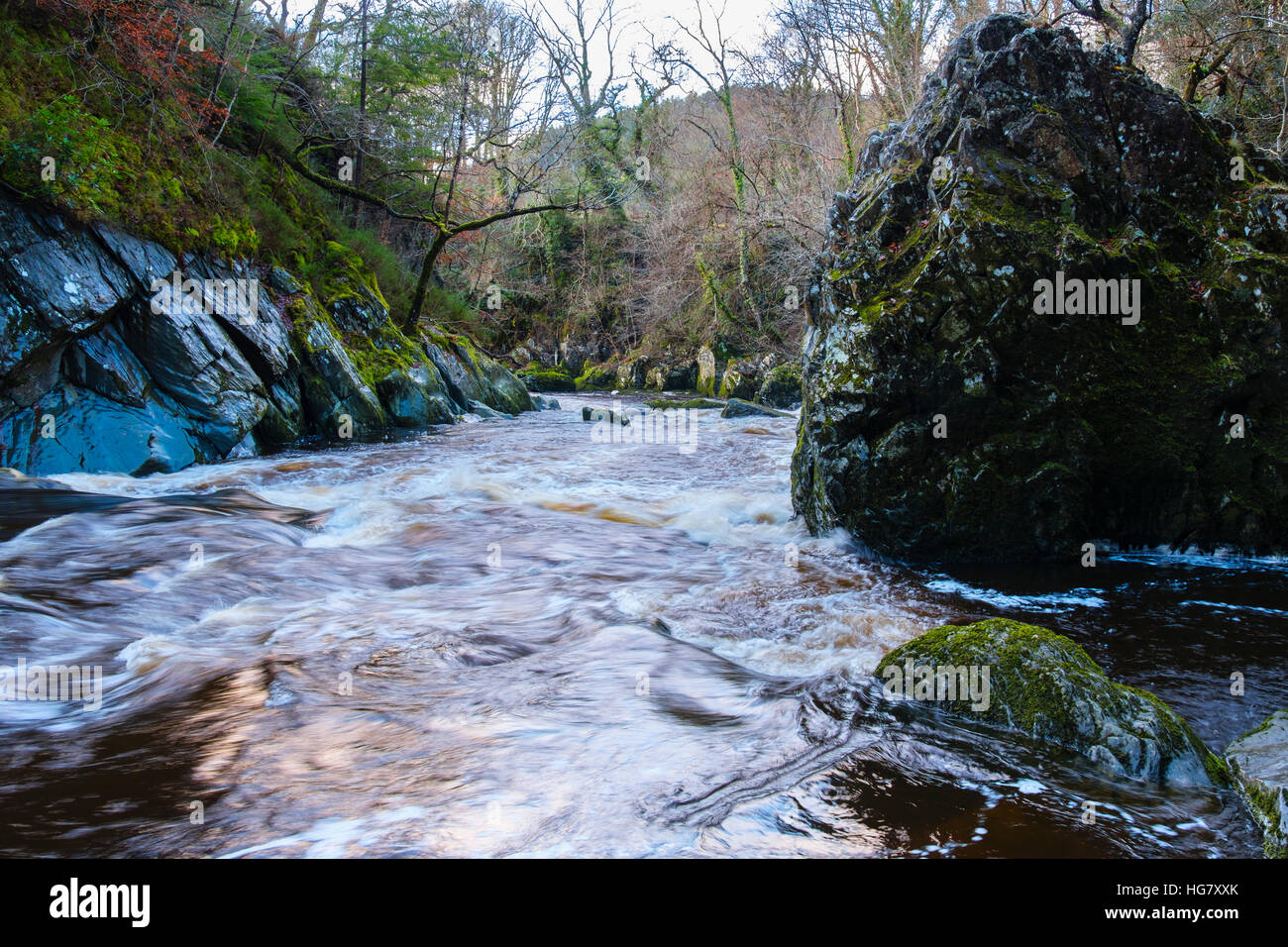 Looking downstream along Afon Conwy River flowing through Fairy Glen ...
