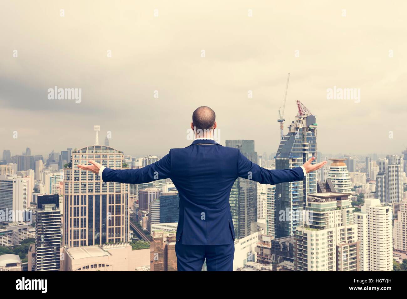 Business standing rooftop concept hi-res stock photography and images ...