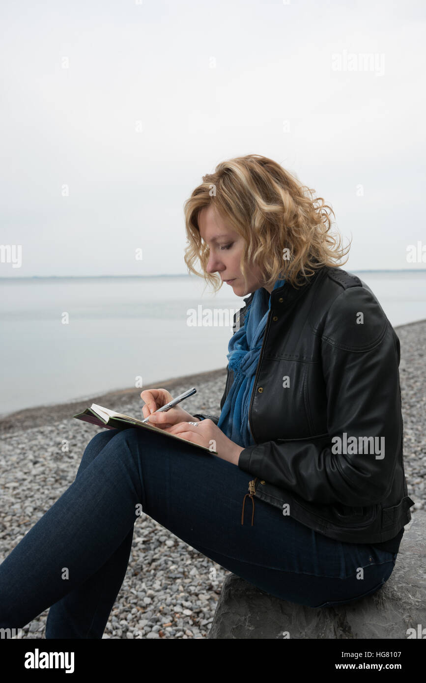 Beautiful women in writing hi-res stock photography and images - Alamy