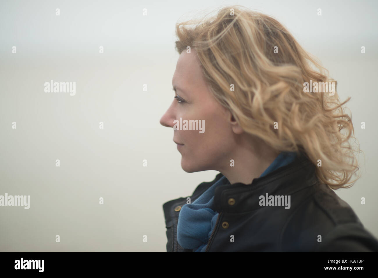 Portrait of a woman on a windy day Stock Photo - Alamy