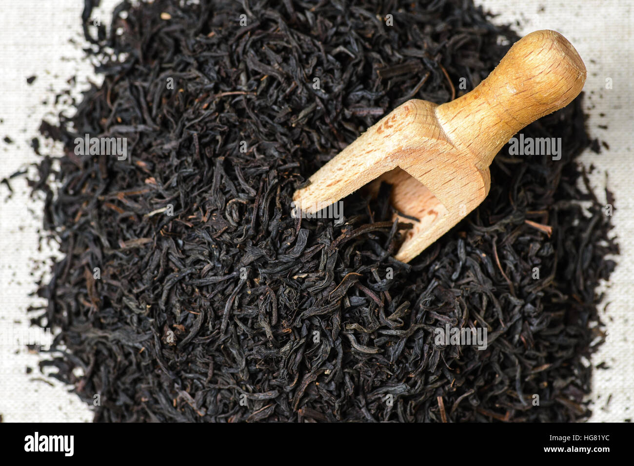 Black tea loose dry on a white background Stock Photo - Alamy