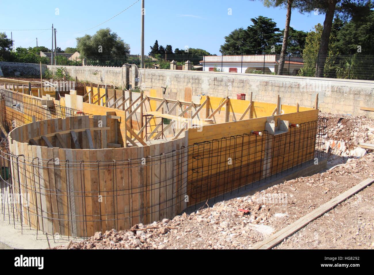 In-ground swimming pool under construction Stock Photo - Alamy
