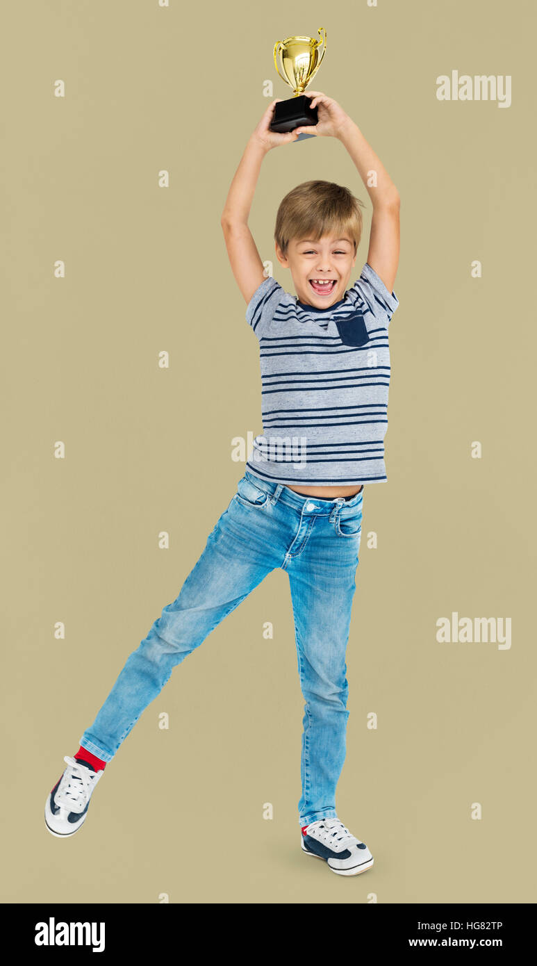 Boy Won Award Reward Cup Prize Concept Stock Photo - Alamy