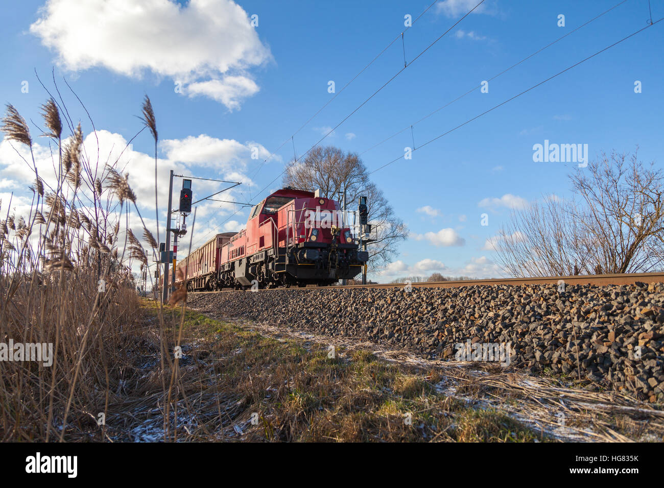 german cargo train drives on tracks to freight yard Stock Photo - Alamy
