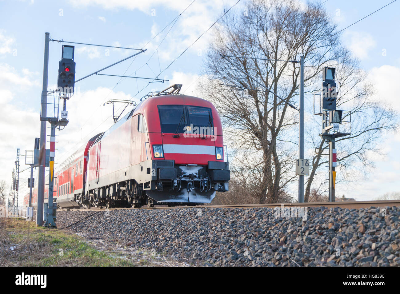 german passenger train drives to the next station Stock Photo - Alamy