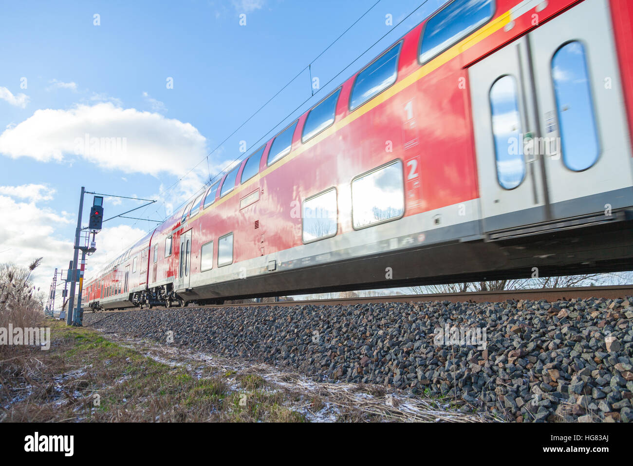 german passenger train drives to the next station Stock Photo - Alamy