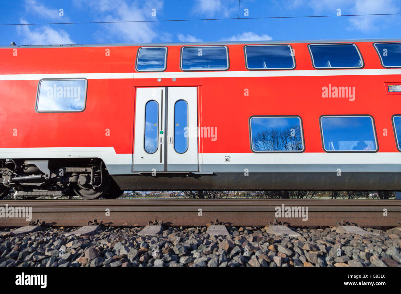 german passenger train drives to the next station Stock Photo - Alamy