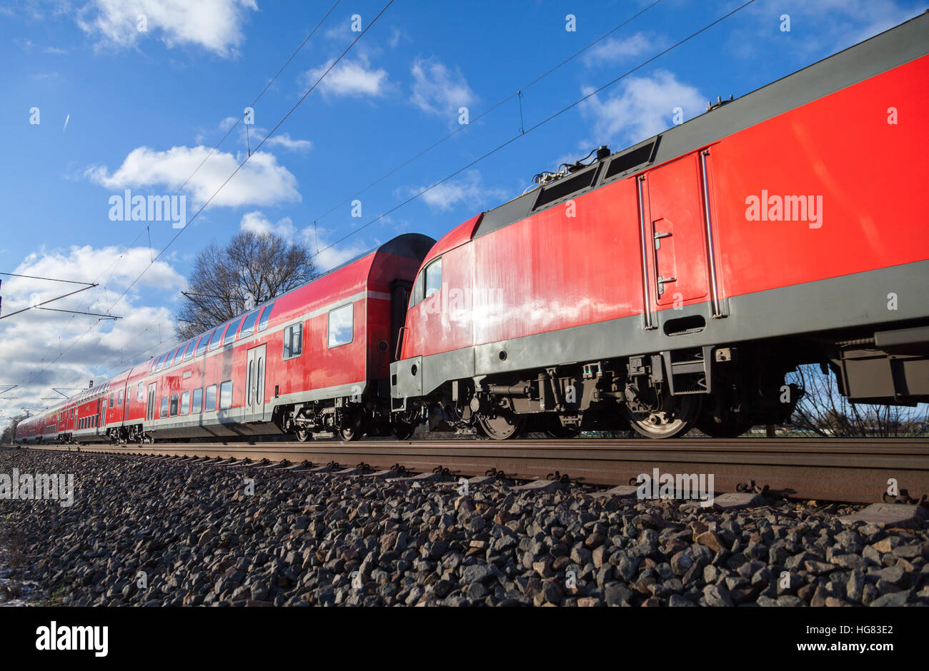 german passenger train drives to the next station Stock Photo - Alamy