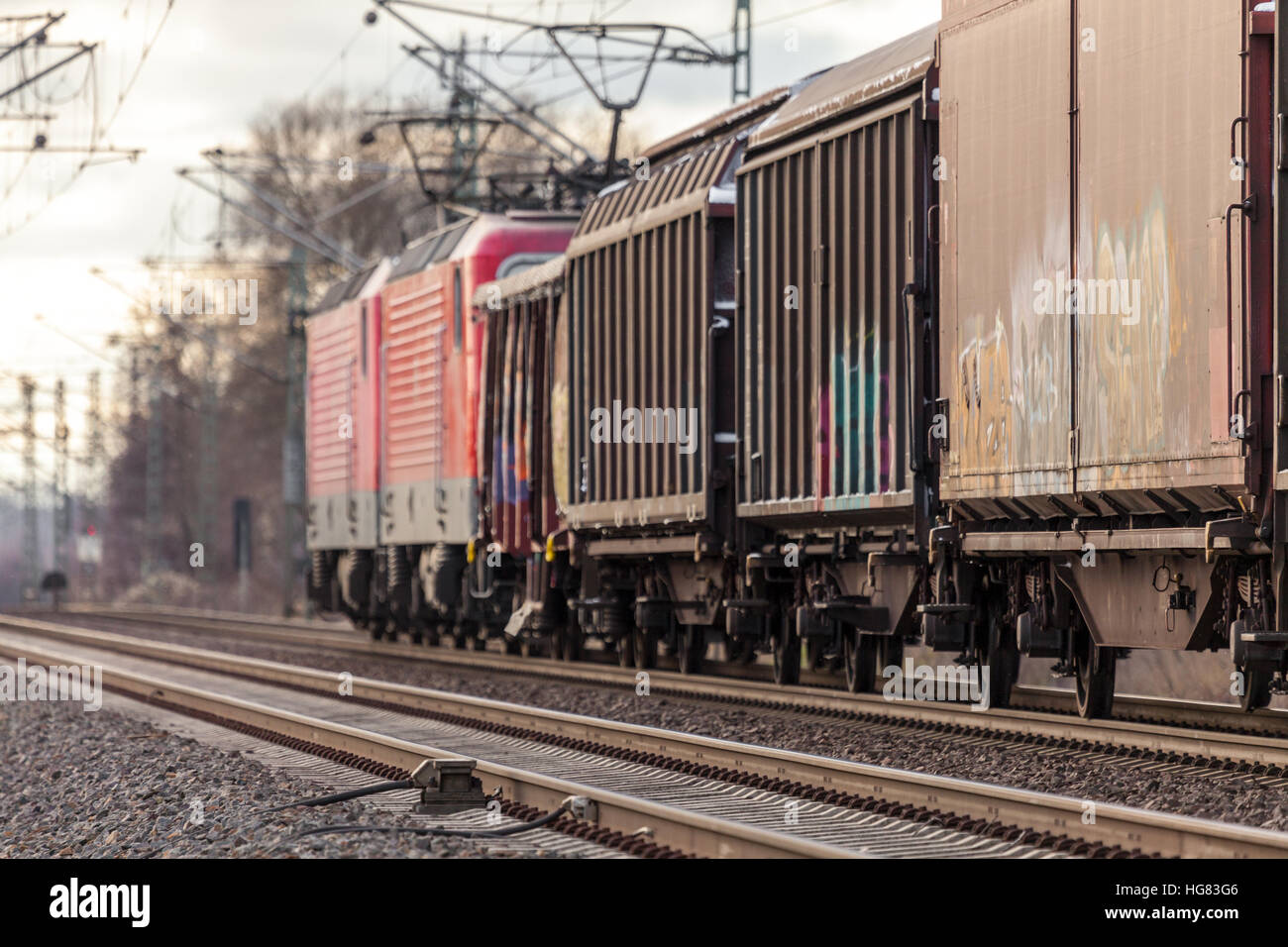 german cargo train drives on tracks to freight yard Stock Photo - Alamy