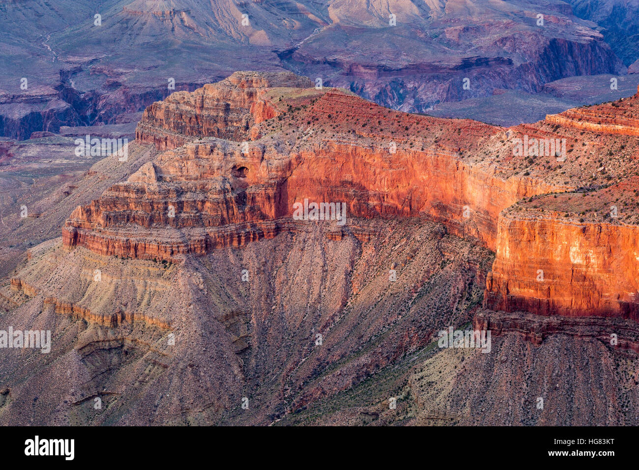 Sunset light lighting up a ridge in the Grand Canyon below Yavapai ...