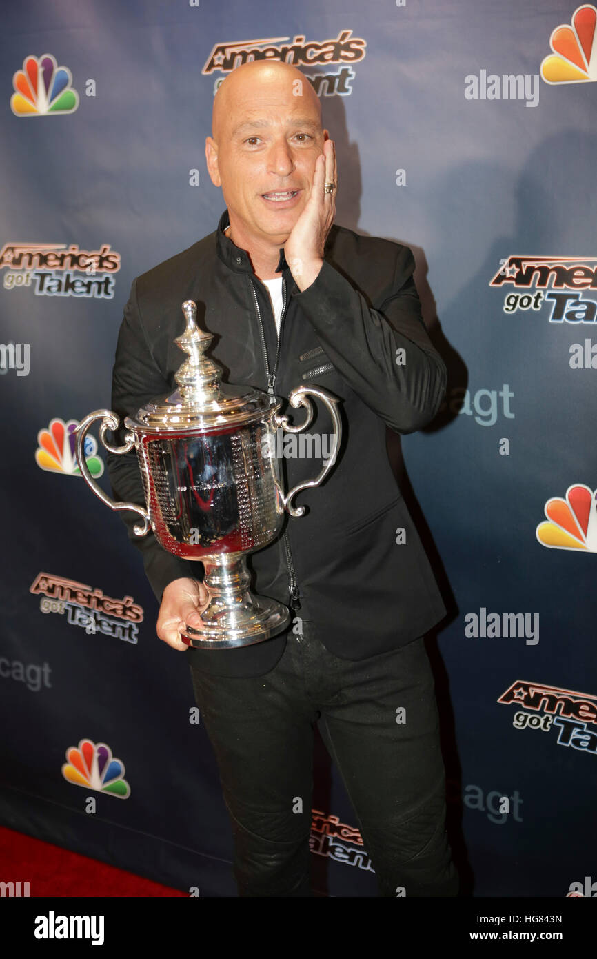 Howie Madel poses with the U.S. Open trophy as he arrives at the ...