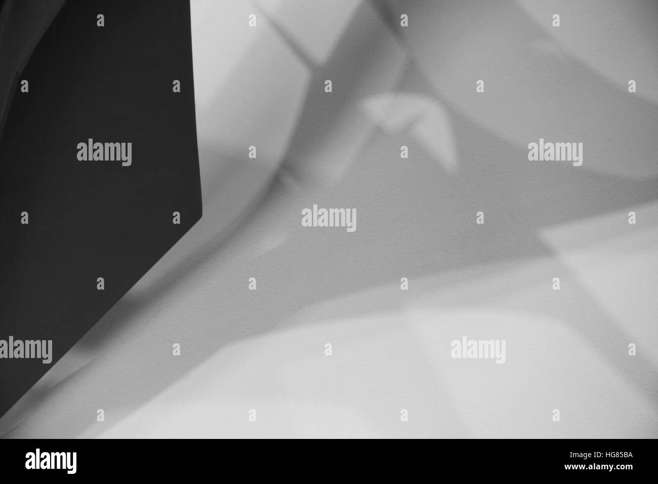 Shadows on white walls creating abstract image Stock Photo - Alamy