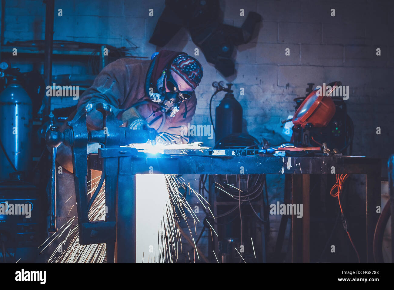 worker welding in workshop Stock Photo - Alamy