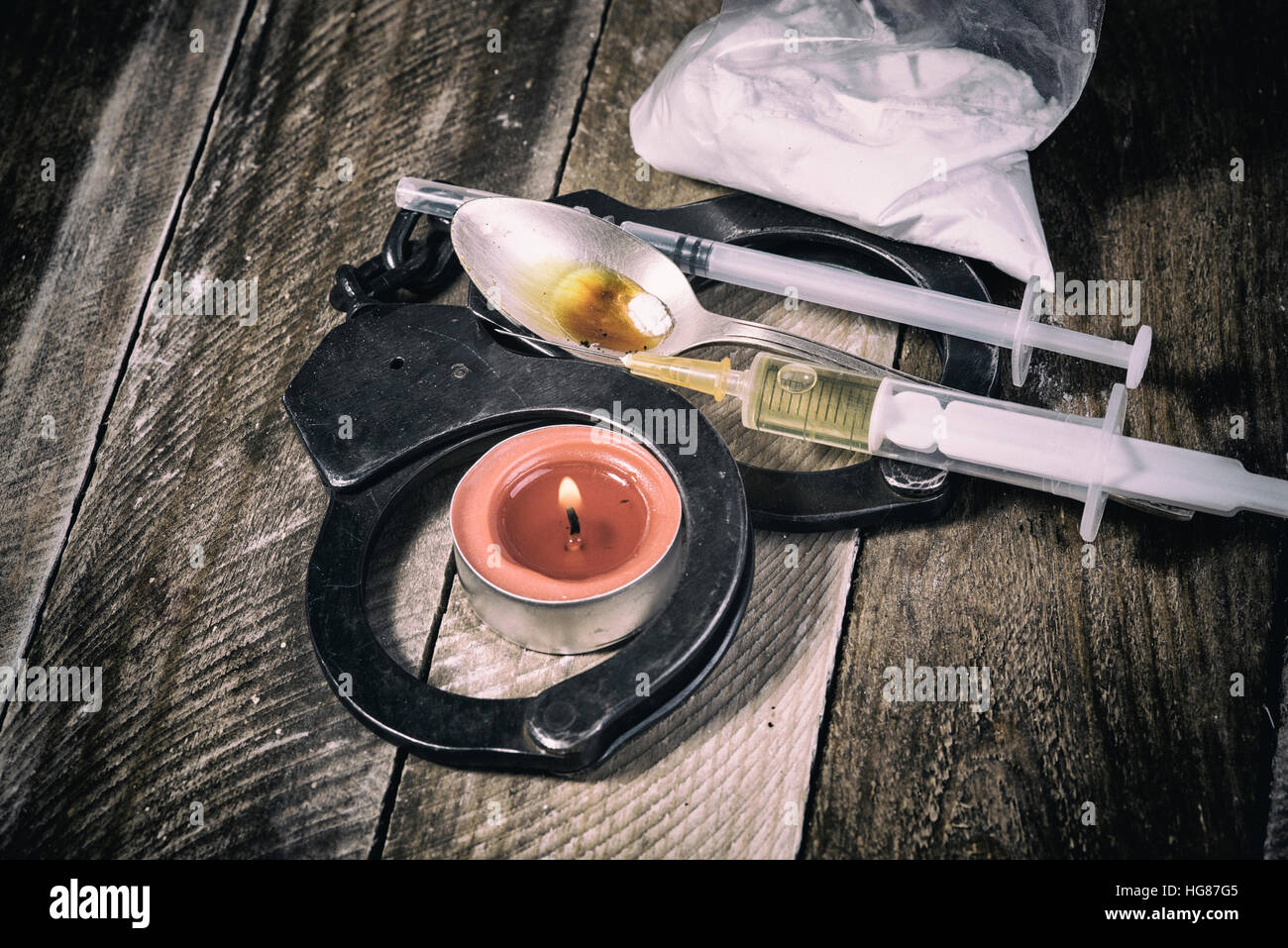 Drug syringe and cooked heroin Stock Photo - Alamy