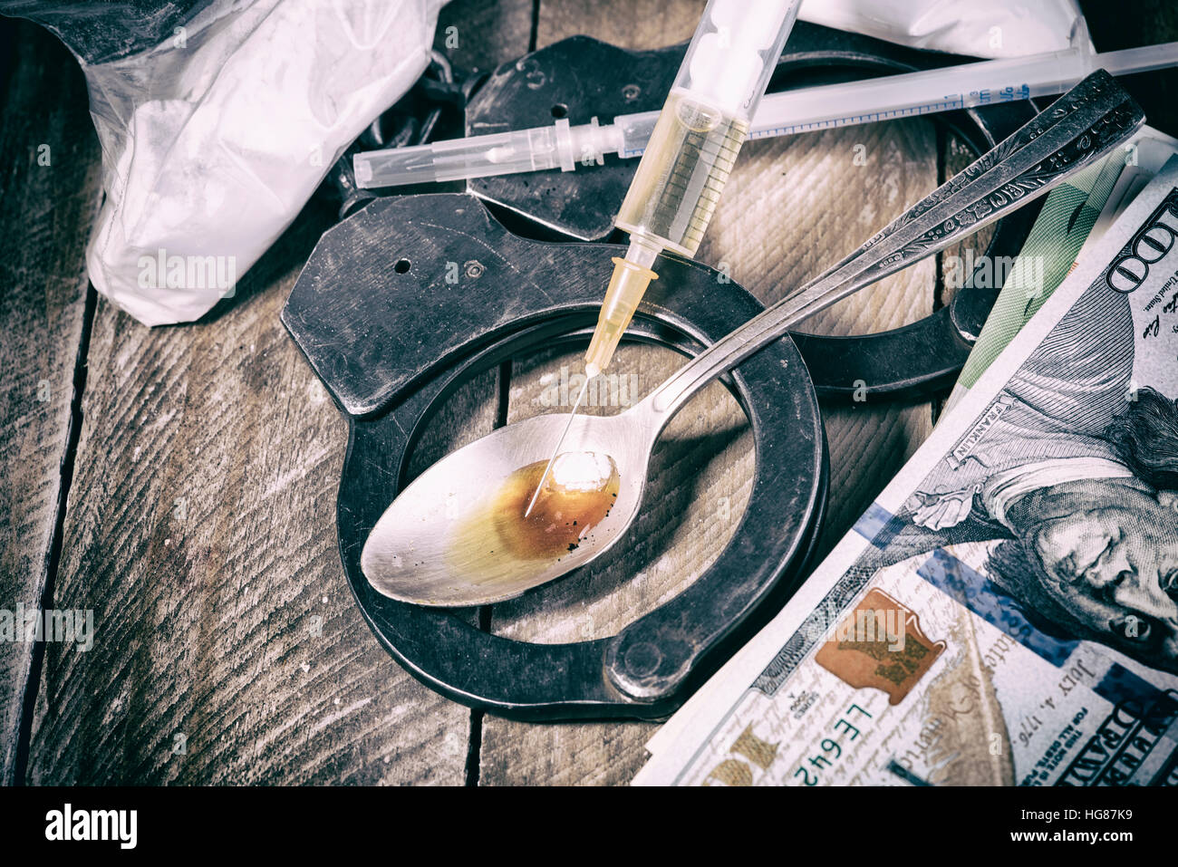 Drug syringe and cooked heroin Stock Photo - Alamy