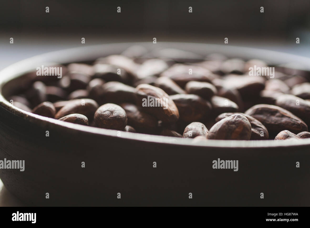 Close-up of coco beans in bowl Stock Photo - Alamy