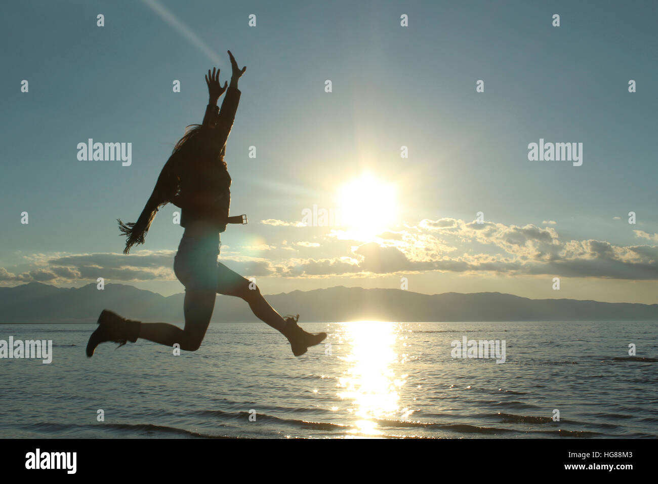 Woman jumping water hi-res stock photography and images - Alamy