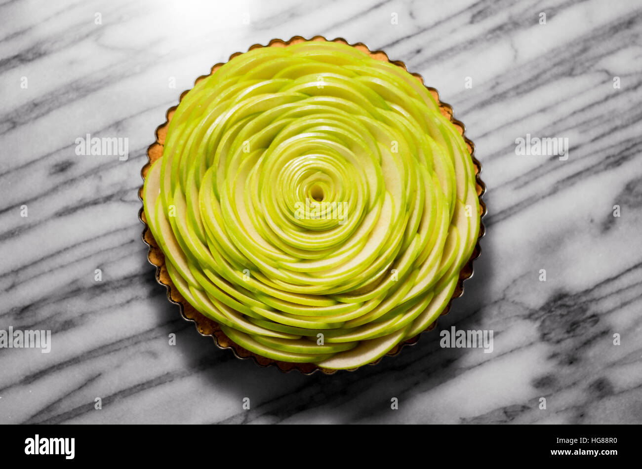 Overhead view of rose apple pie on marble counter Stock Photo - Alamy