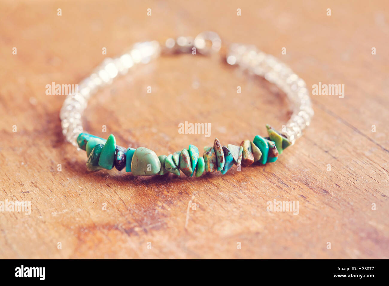 Mineral stone bracelet on the table Stock Photo - Alamy