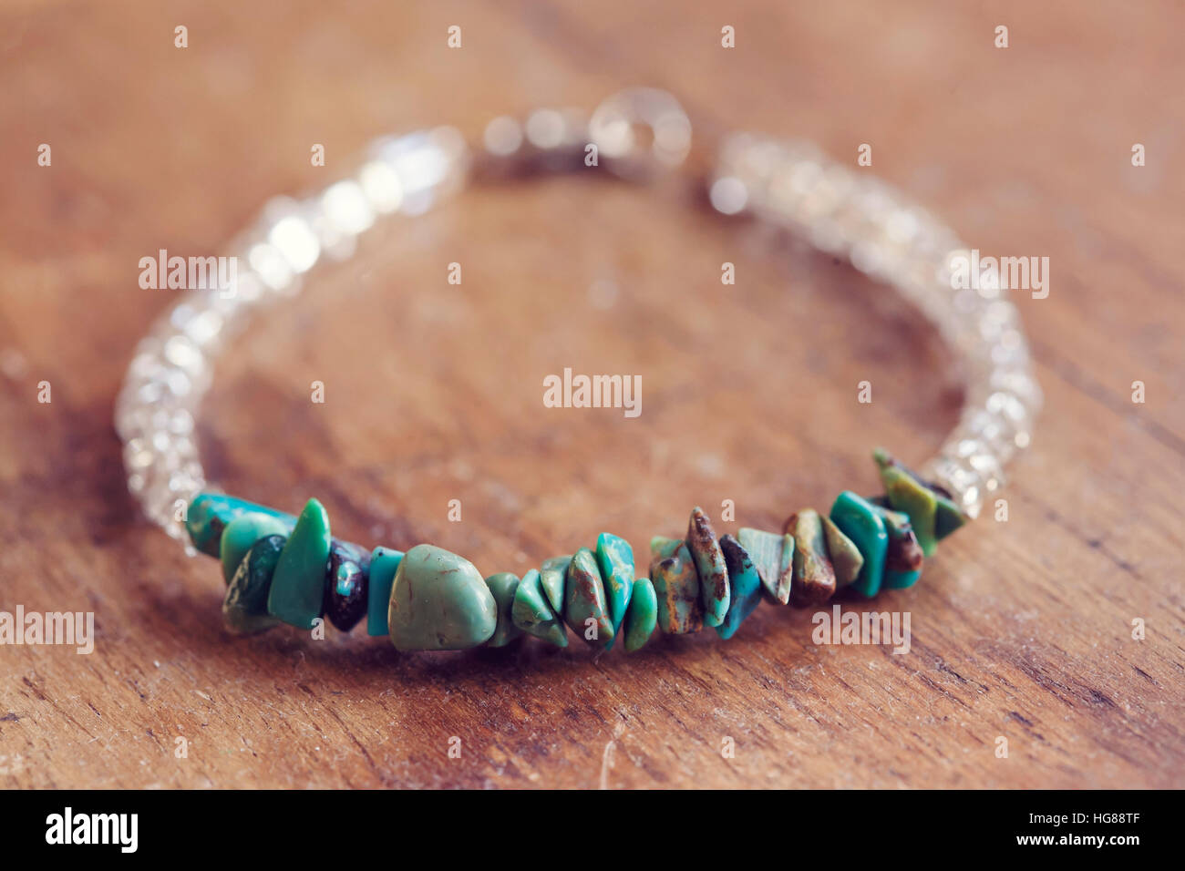 Mineral stone bracelet on the table Stock Photo - Alamy