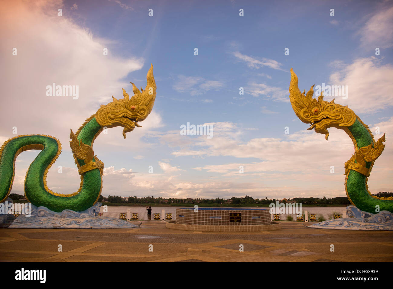 a Phayanak or Naga Statue at the mekong river in the town of Nong Khai ...