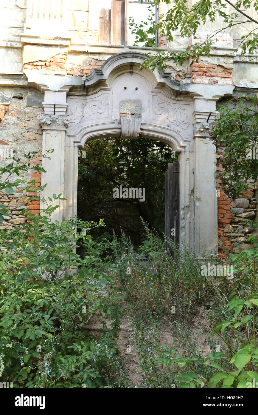 Portal of a destroyed palace in Maniow Maly, Lower Silesia, Poland ...