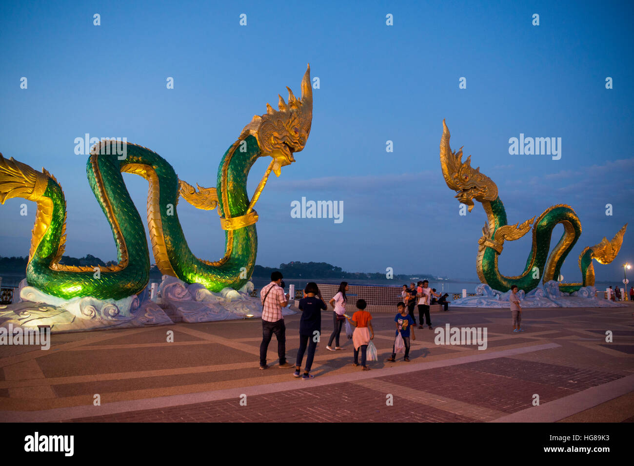 a Phayanak or Naga Statue at the mekong river in the town of Nong Khai ...