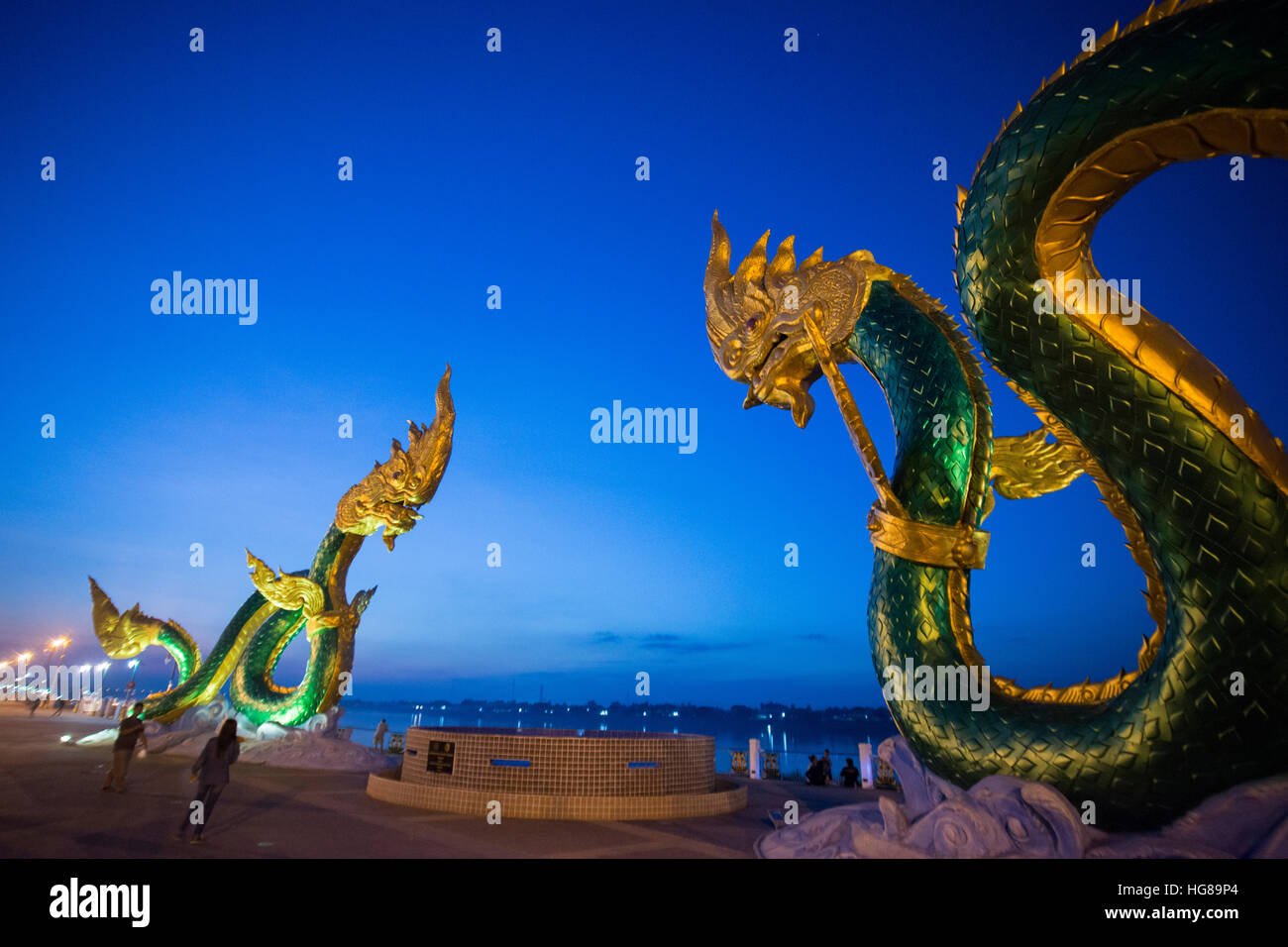 a Phayanak or Naga Statue at the mekong river in the town of Nong Khai ...