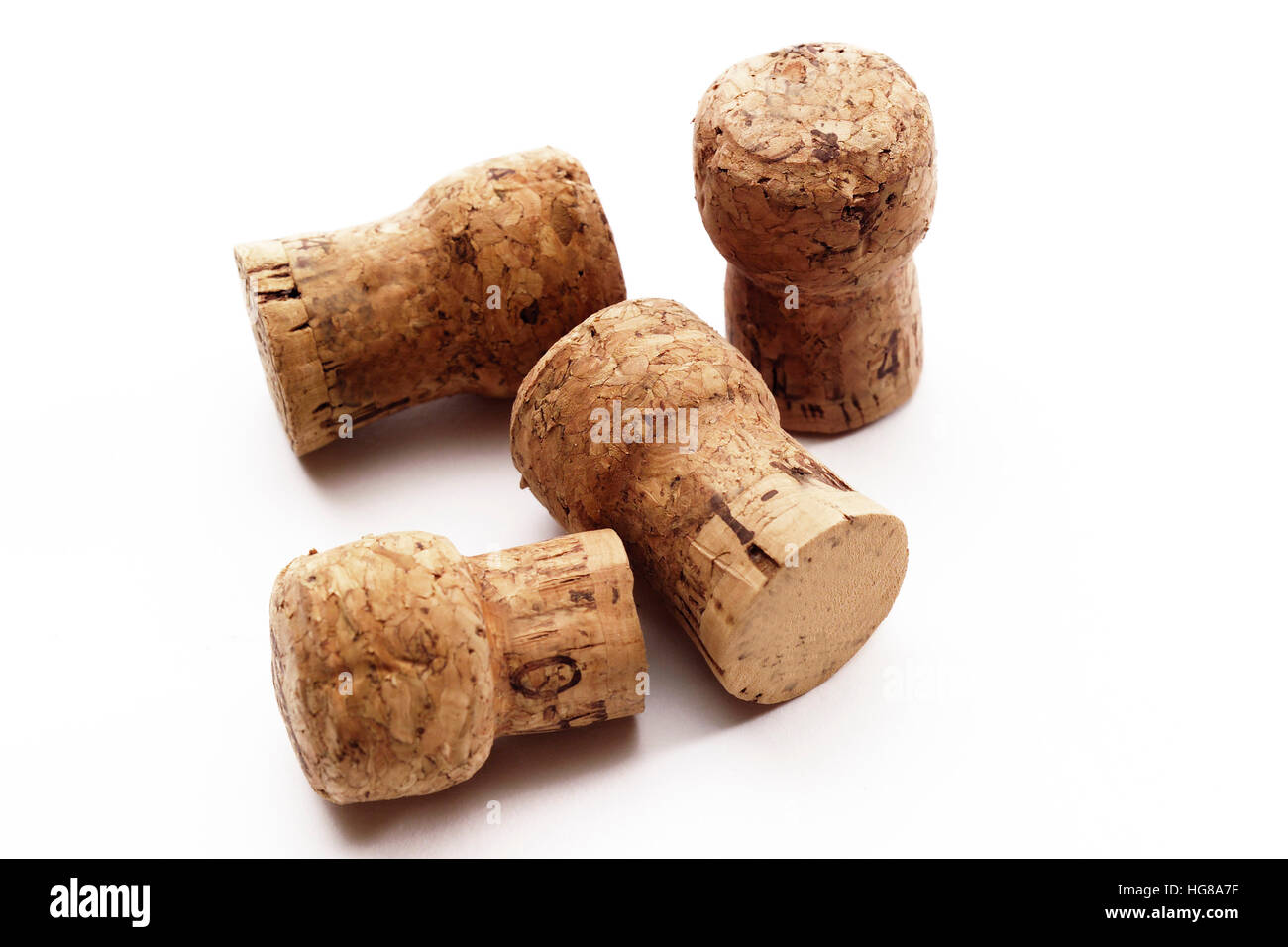 Four champagne corks Stock Photo - Alamy