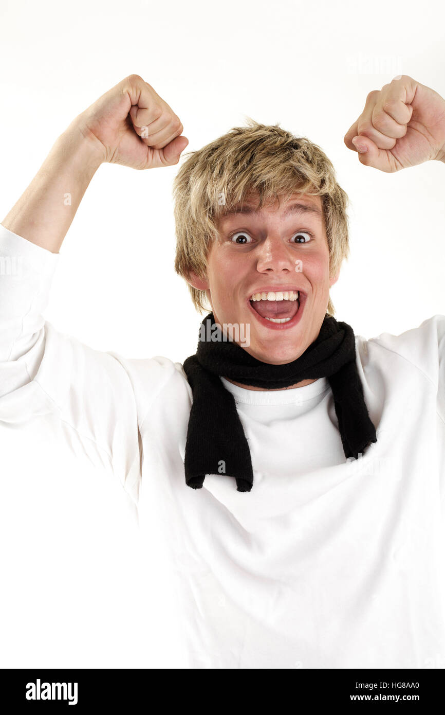 Young man exclaiming victory Stock Photo - Alamy