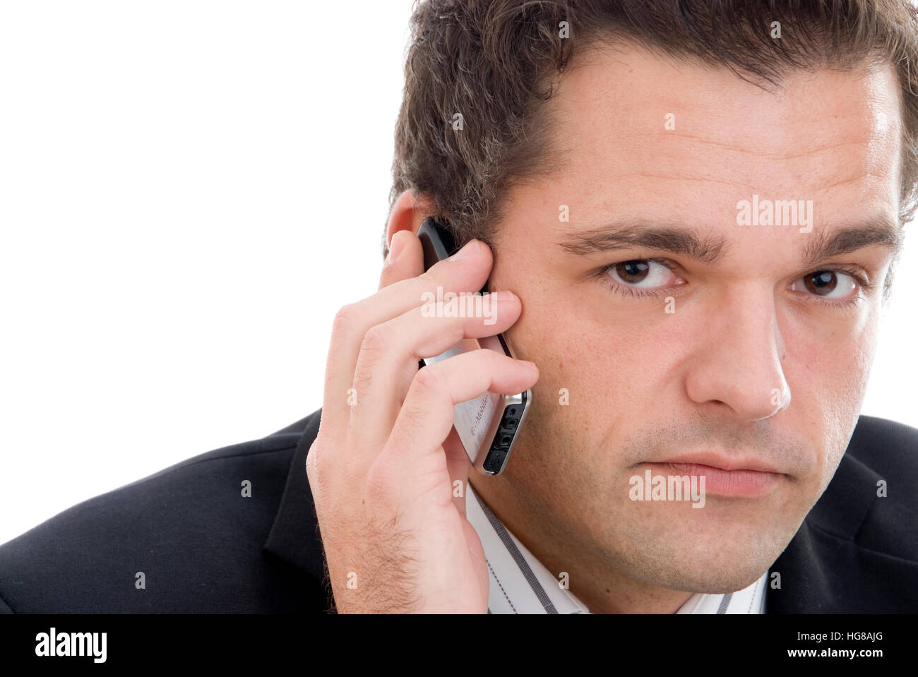 Young man with mobile phone Stock Photo - Alamy