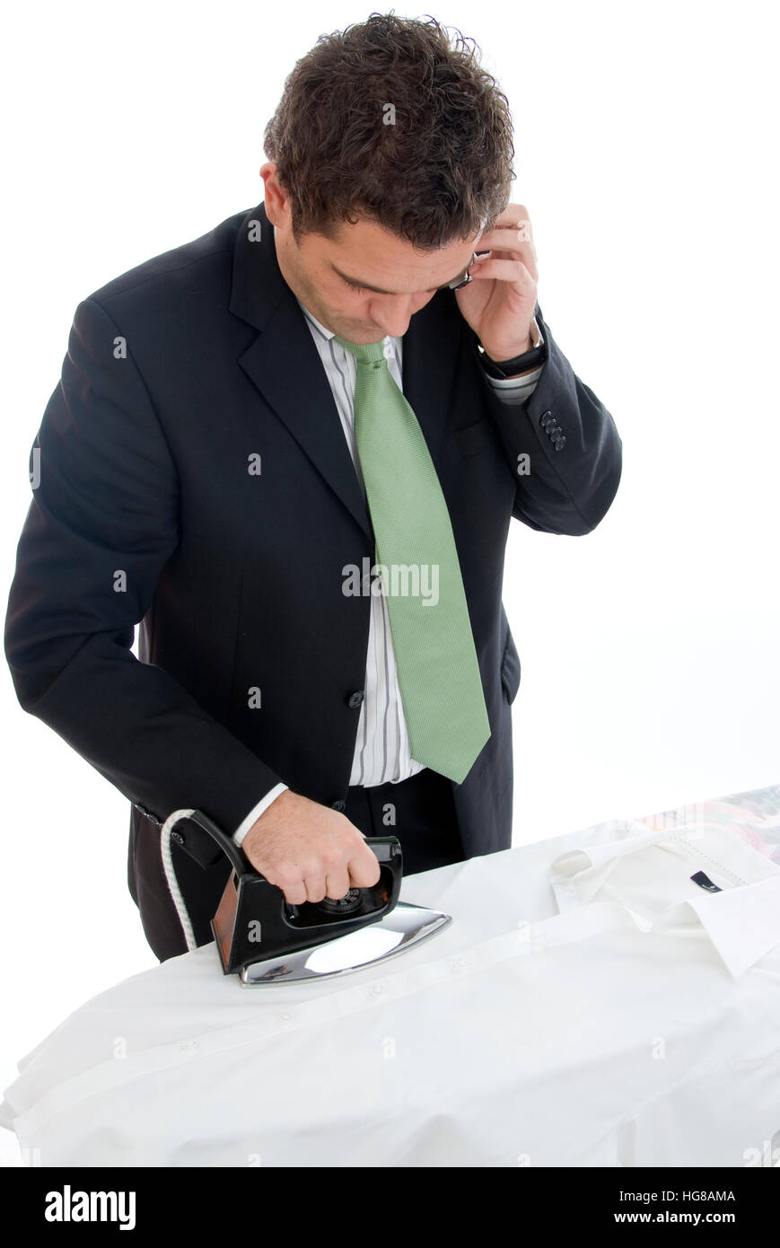 Businessman does ironing Stock Photo - Alamy