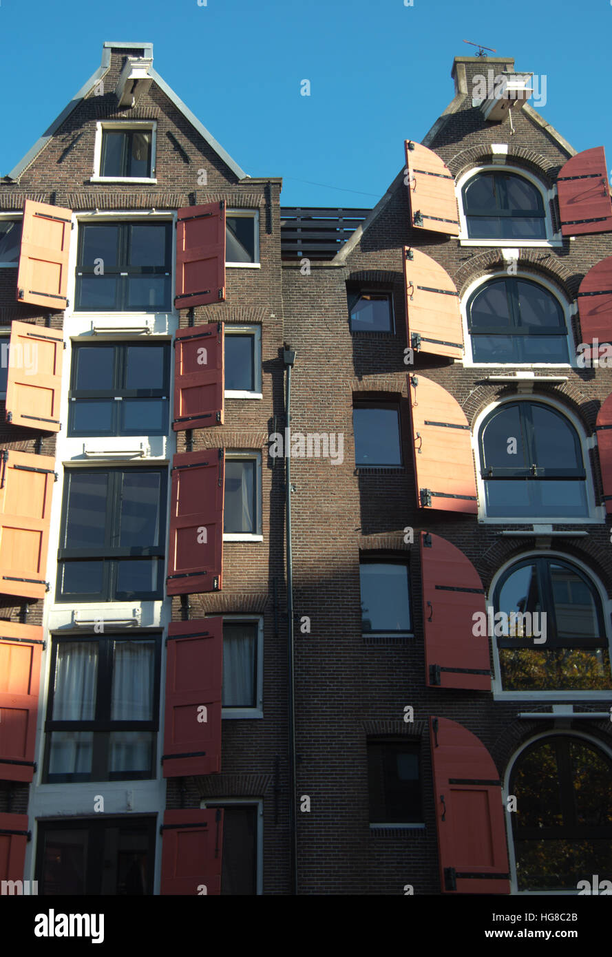 Amsterdam canal house windows Stock Photo - Alamy