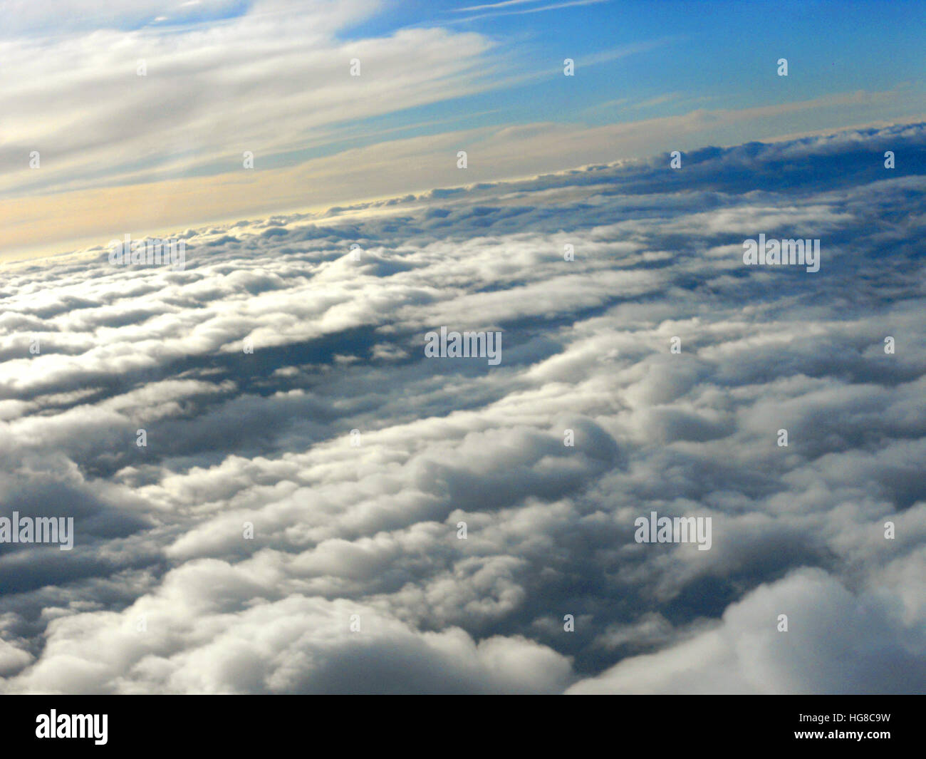 Aerial view above clouds Stock Photo - Alamy
