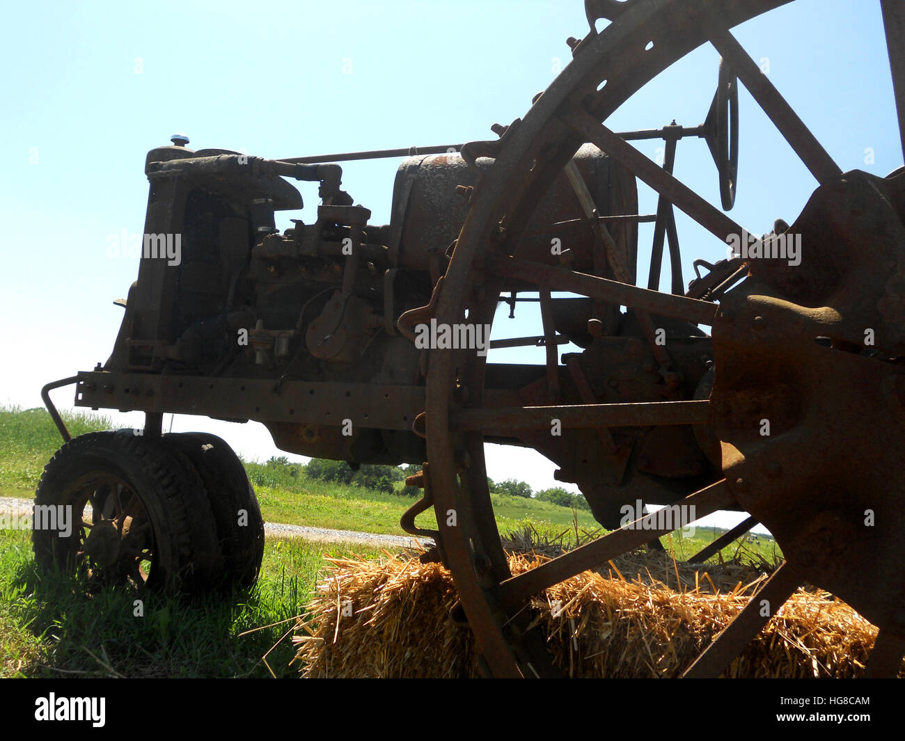 Old metal tractor at farm Stock Photo - Alamy
