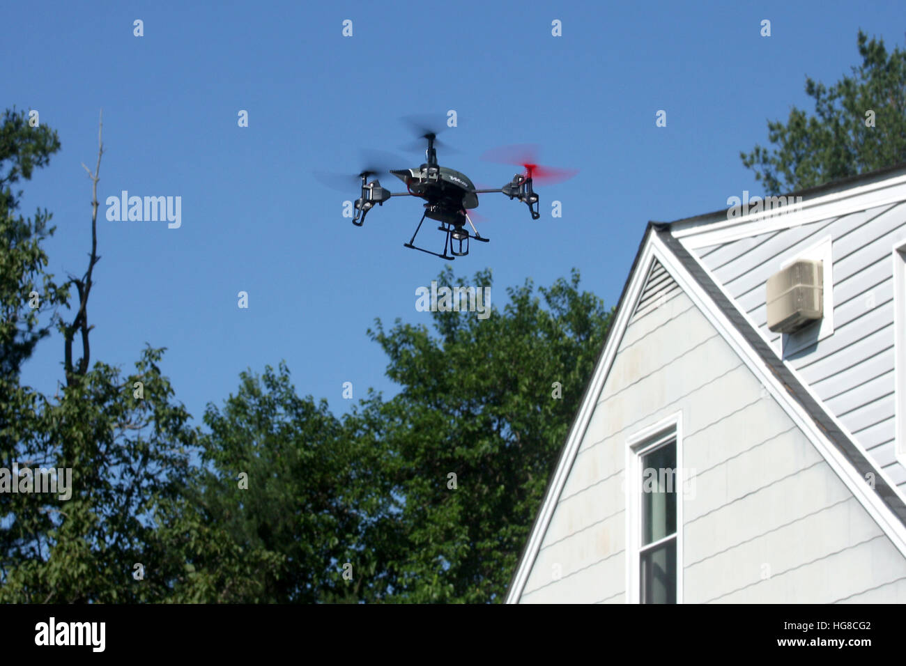 Drone in flight Stock Photo - Alamy
