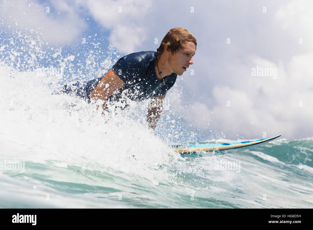 Man surfboarding in sea hi-res stock photography and images - Alamy