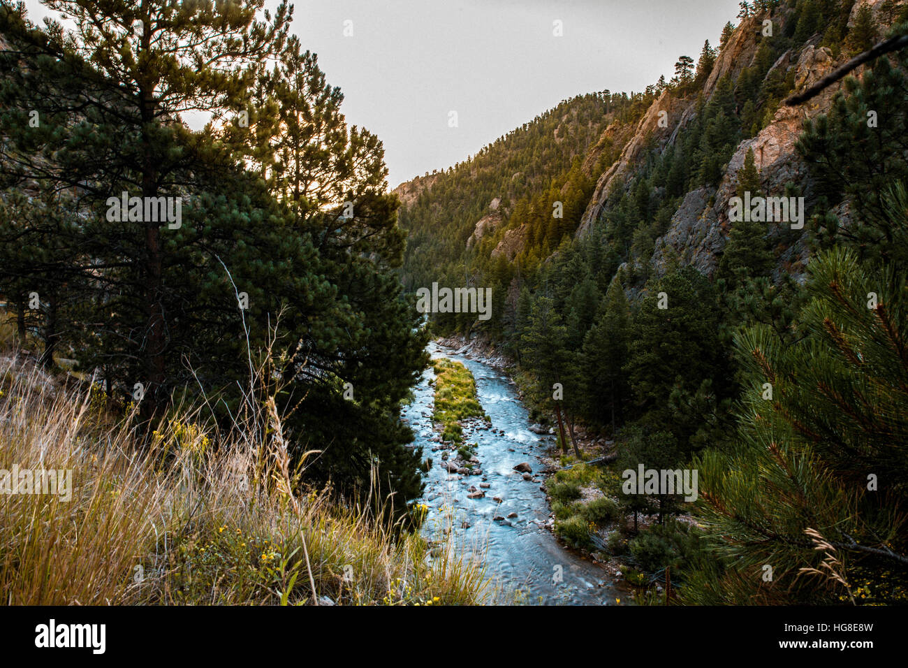 High angle view of river flowing amidst mountains Stock Photo - Alamy