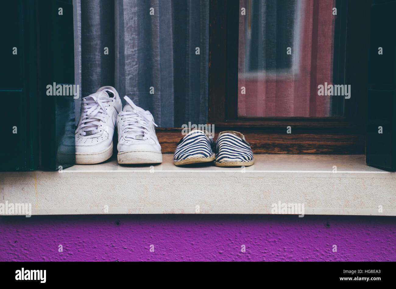 Close-up of shoes on window sill Stock Photo - Alamy