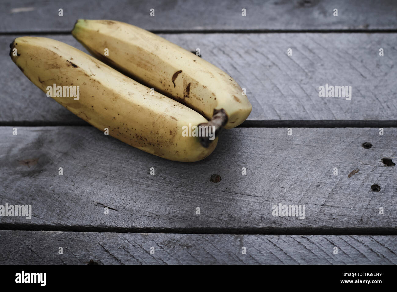 Overhead view of bananas on table Stock Photo - Alamy