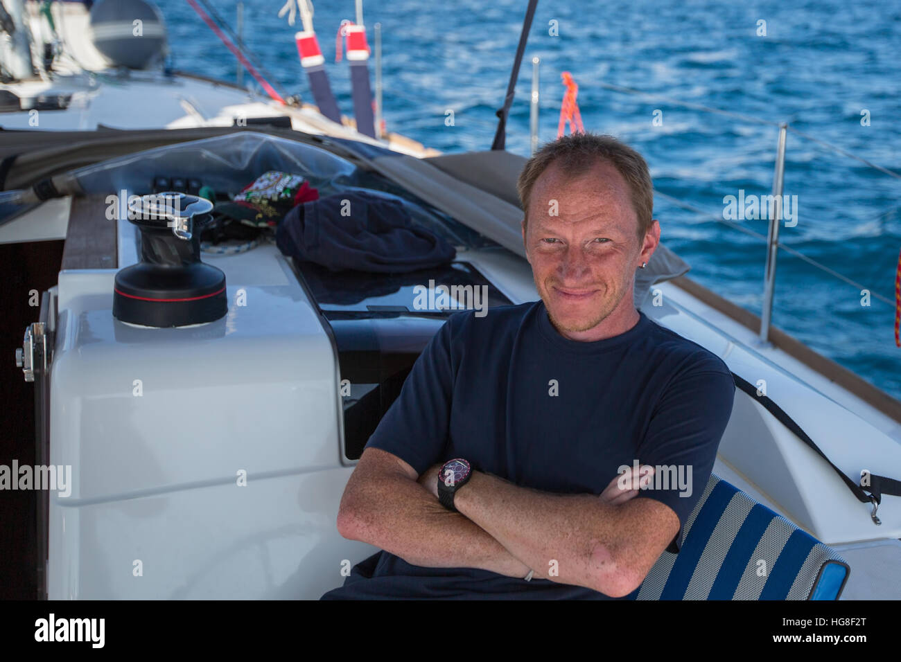 Man skipper sits on his sail yacht. Vacation, sailing, travel Stock ...