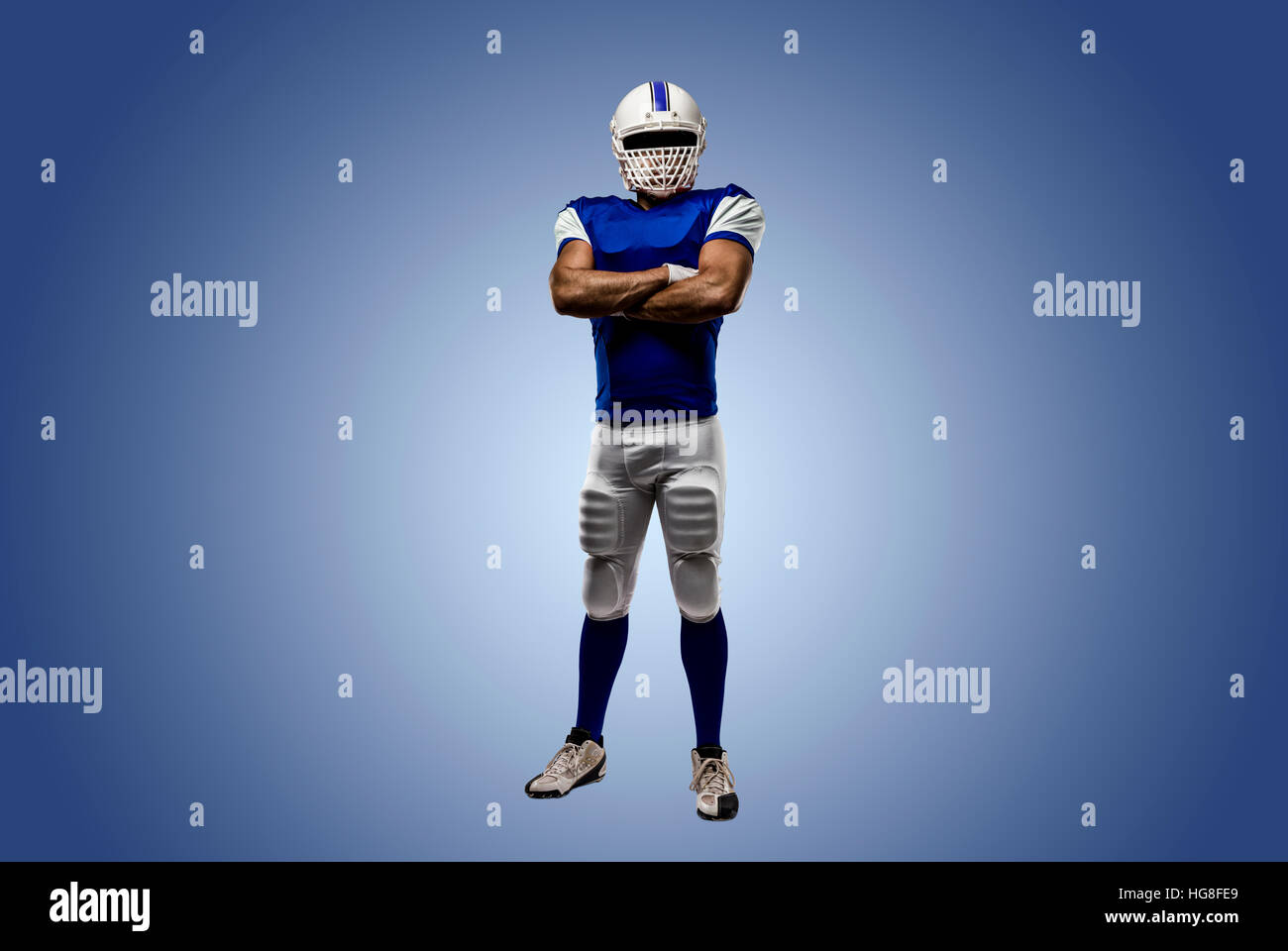 Football Player with a blue uniform on a blue background Stock Photo ...