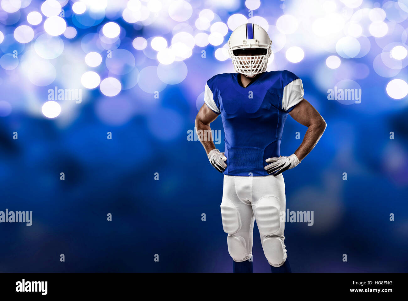 Football Player with a blue uniform on a blue lights background Stock ...