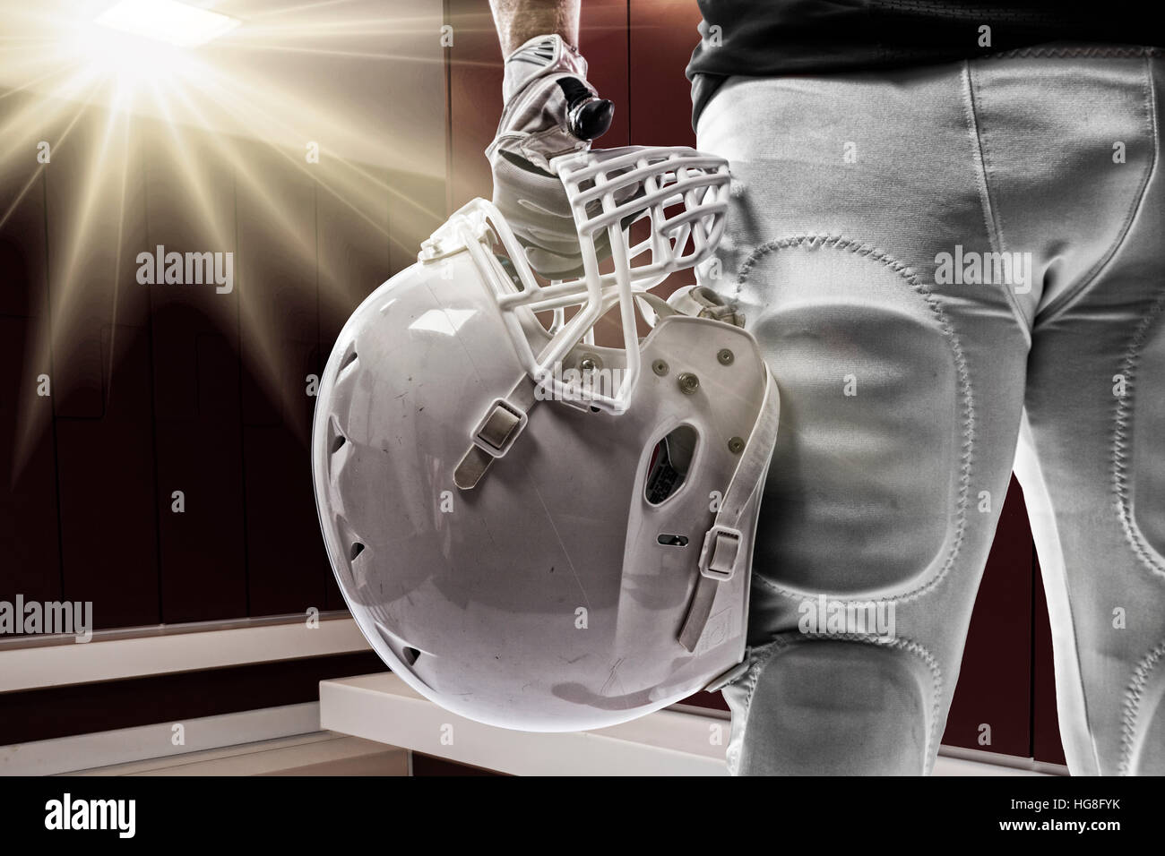 Football Player with a Black uniform on a Locker roon Stock Photo - Alamy