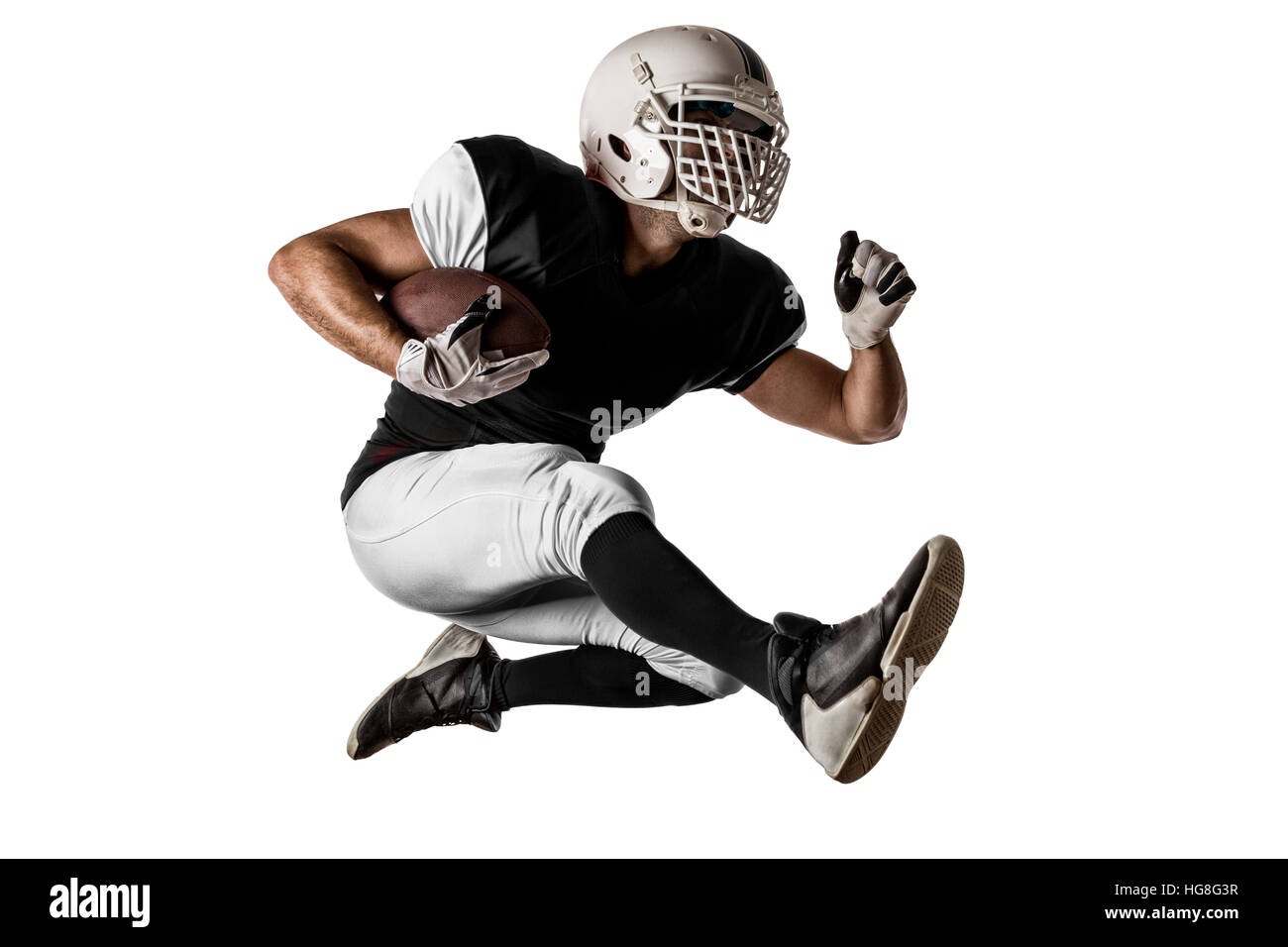 Football Player with a black uniform Running on a white background ...