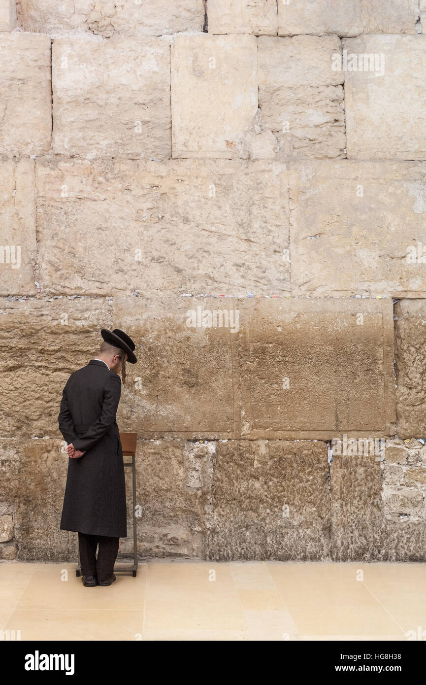 Israel, Jerusalem, orthodox man praying at the western wall Stock Photo ...