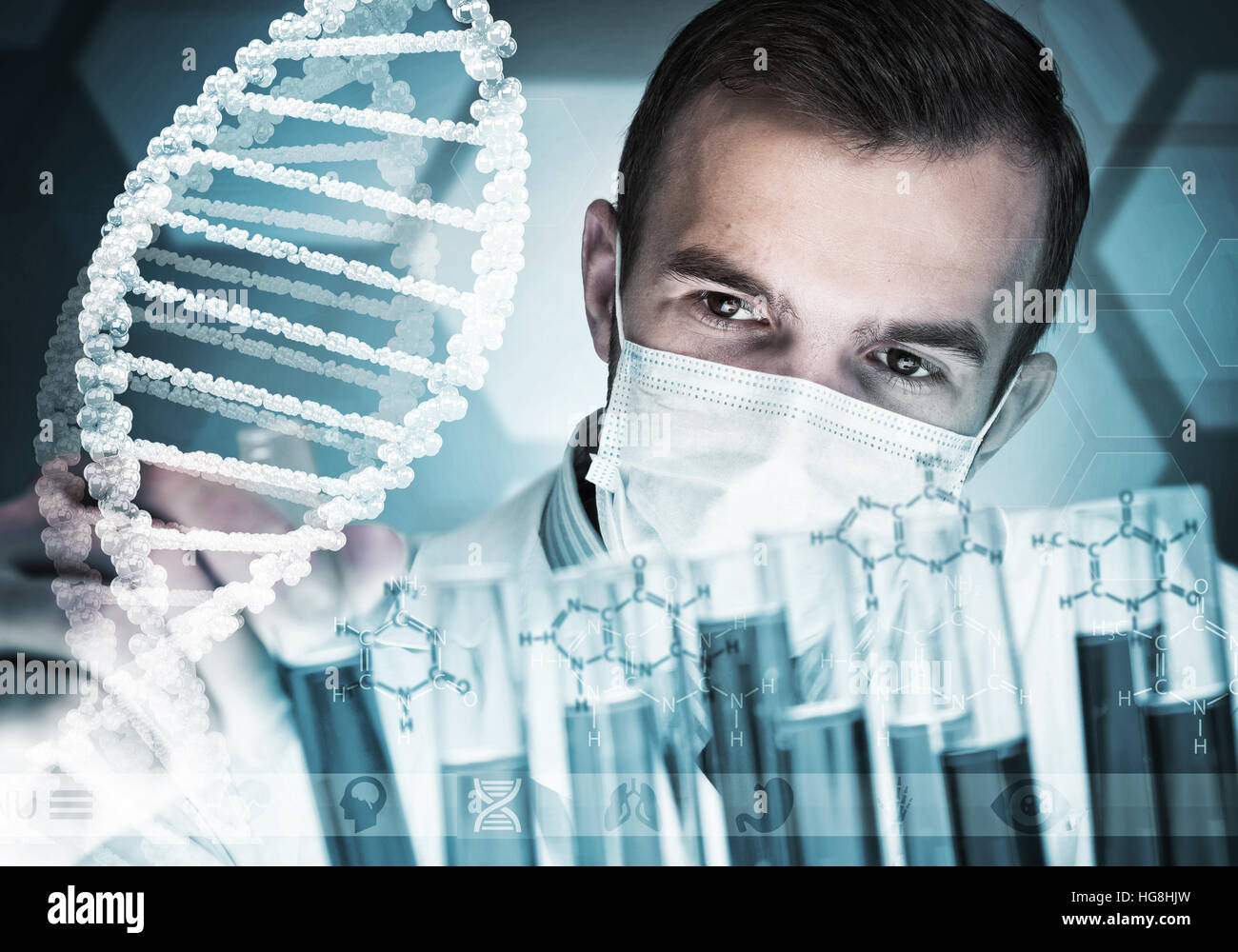 Young scientist mixing reagents in glass flask in clinical laboratory ...