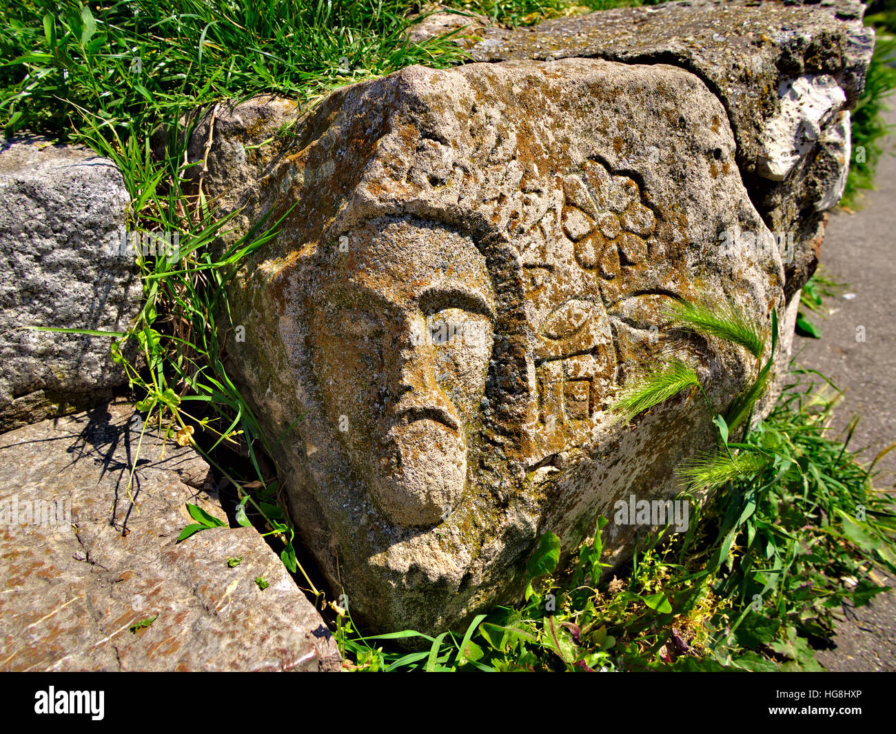 Carved stone face on wall hi-res stock photography and images - Alamy