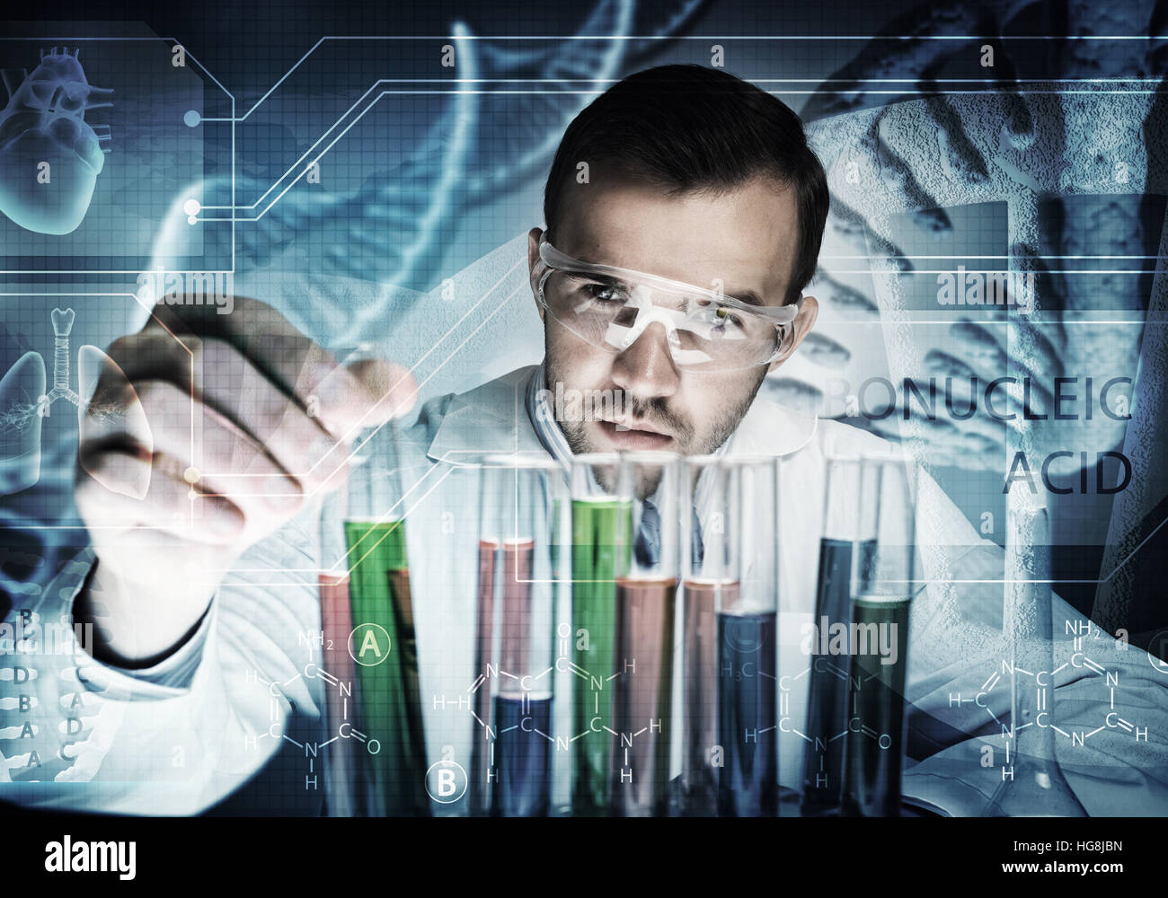 Portrait of concentrated male scientist working with reagents in laboratory Stock Photo - Alamy
